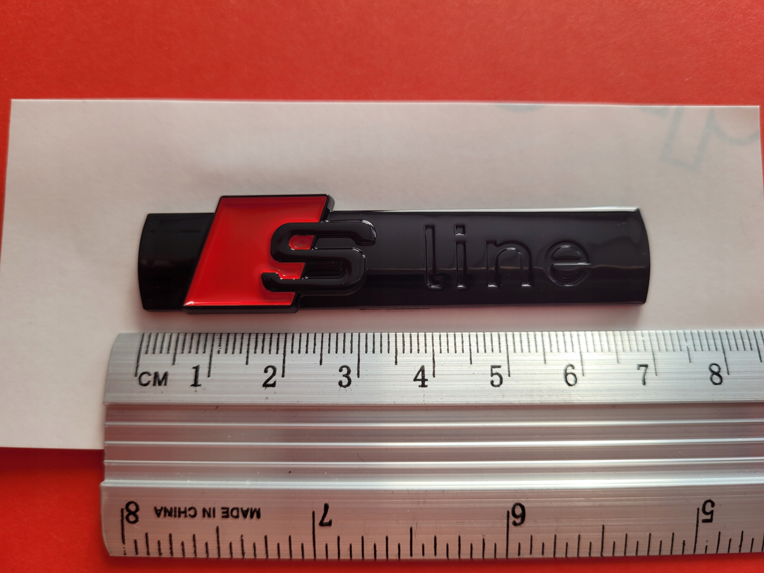 Emb_sline_do_audi_black_glossy_blotnik_70mm_komplet - Емблеми S-Line ...