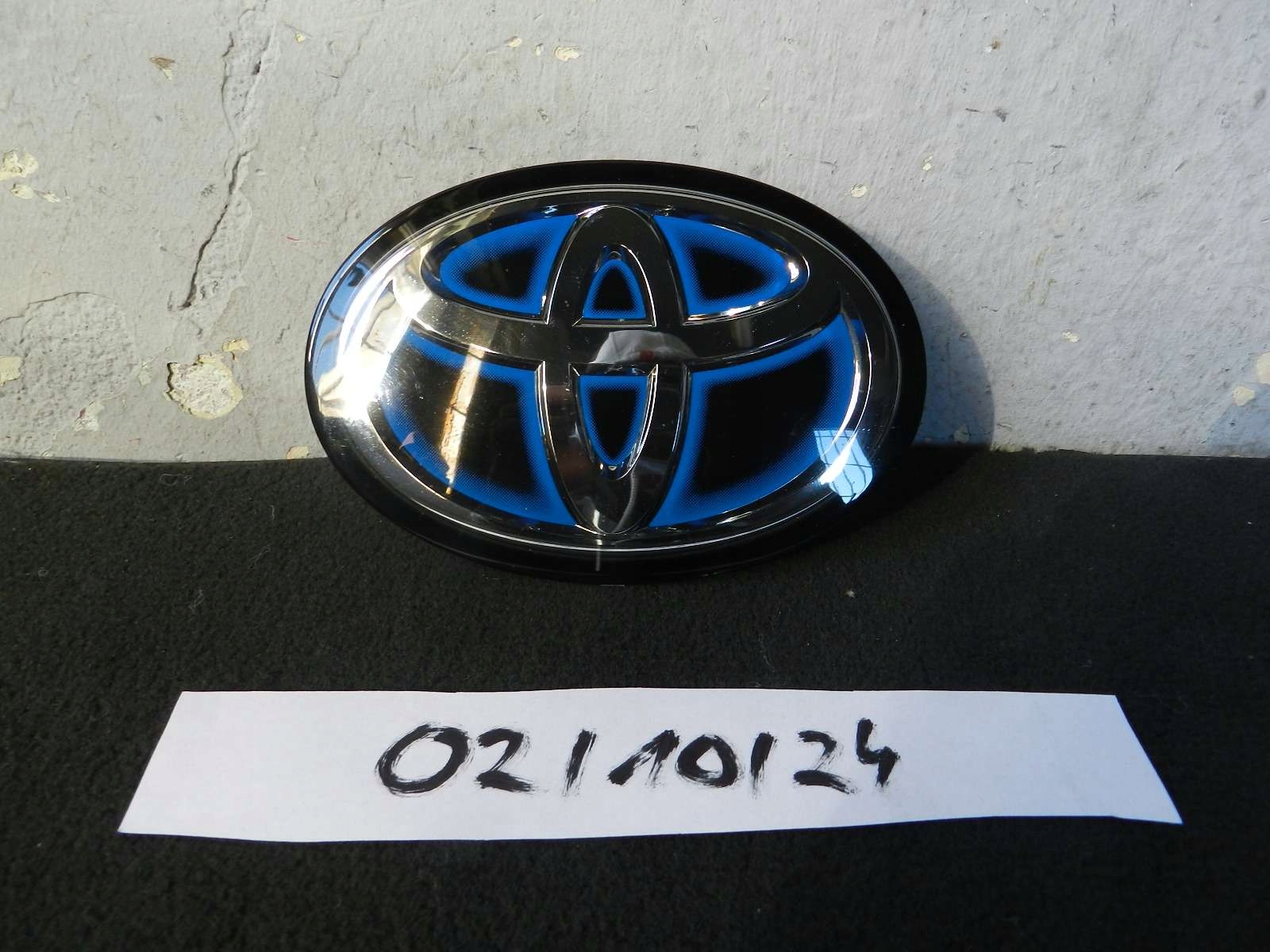 Emblemat znaczek przód TOYOTA COROLLA E21 2019- YARIS IV 90975-02124 ...