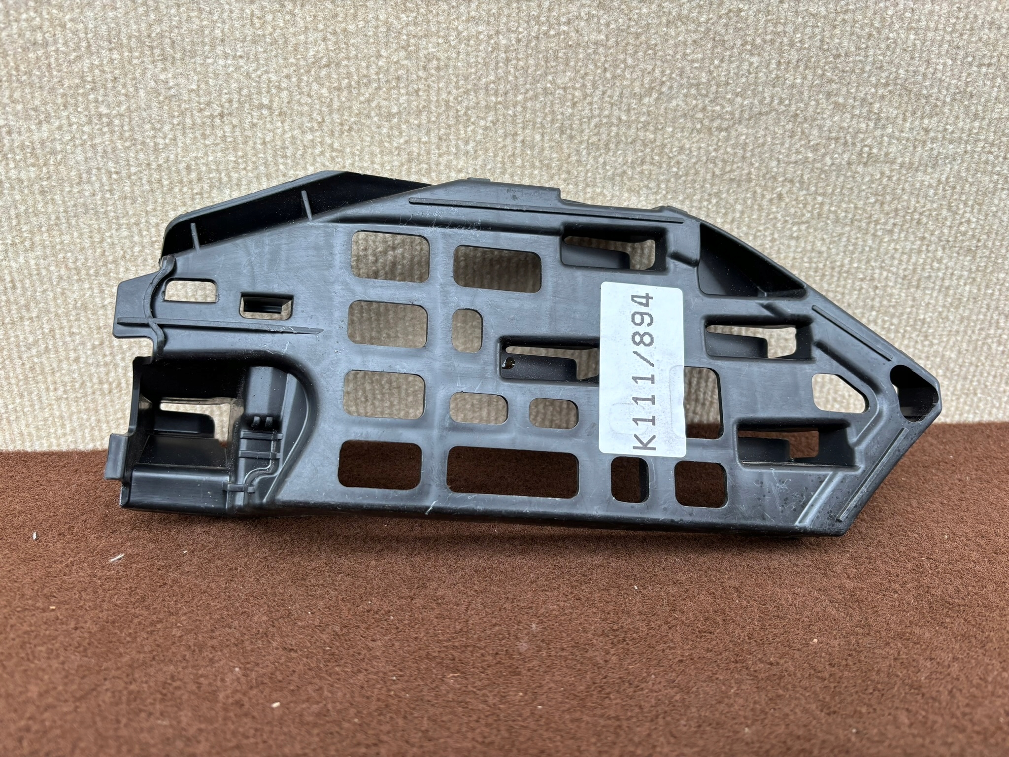 VW POLO 6Q 9N LIFT LEWY ŚLIZG ZDERZAKA PRZÓD UCHWYT 6Q0807177A K111/894 ...