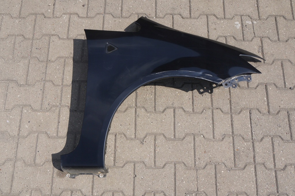 MITSSUBISHI COLT VI LIFT BŁOTNIK PRAWY PRZEDNI X62 - 12402588654 ...