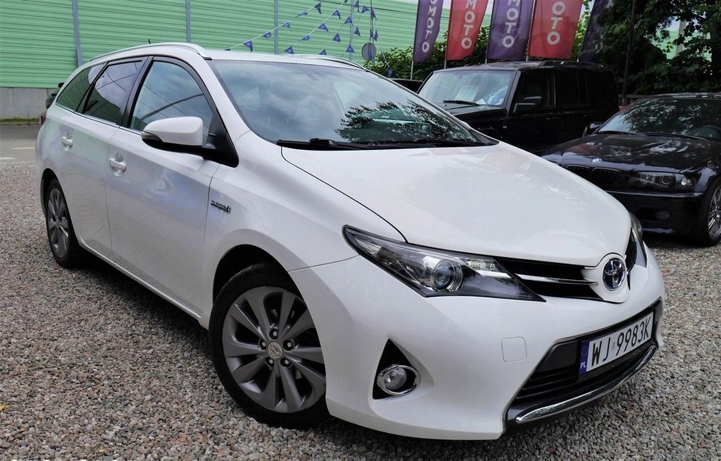 Toyota Auris 1.8 VVT-i Hybrid Automatik Touring Sp - 12514784224 - oficjalne archiwum Allegro