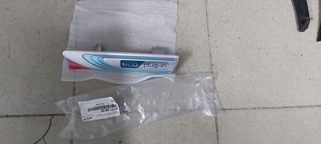 EMBLEMAT BŁOTNIKA LEWY KIA OPTIMA IV 87771-A8100 ECO PLUG-IN NOWY ...