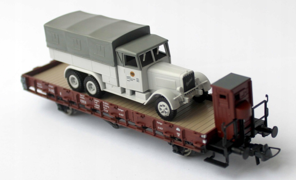 DRG Wagon platforma 2 os. z szarą ciężarówką Roco 66347 AW ...