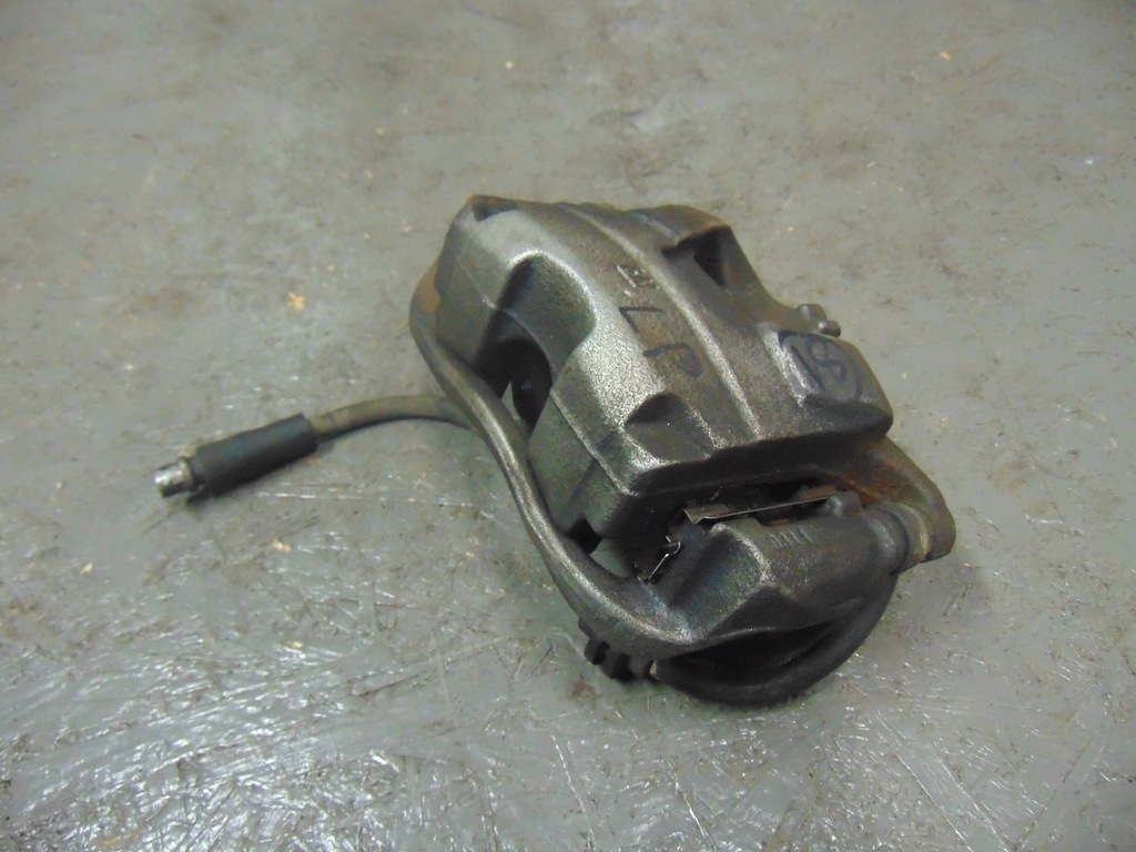 zacisk lewy przód OPEL MOKKA CHEVROLET TRAX - 7083539025 - oficjalne ...