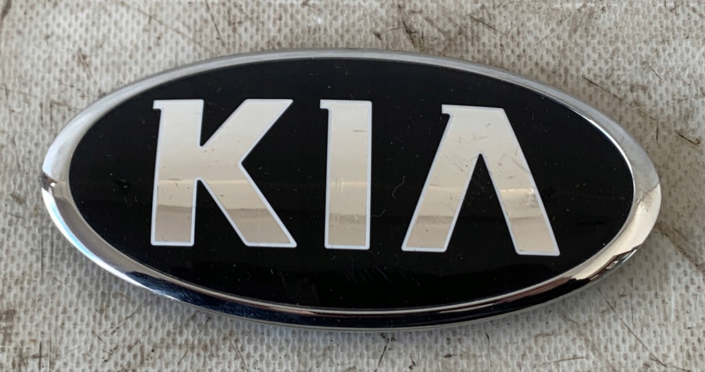 EMBLEMAT LOGO PRZÓD KIA STINGER 86310-J5000 - 12285123424 - oficjalne ...