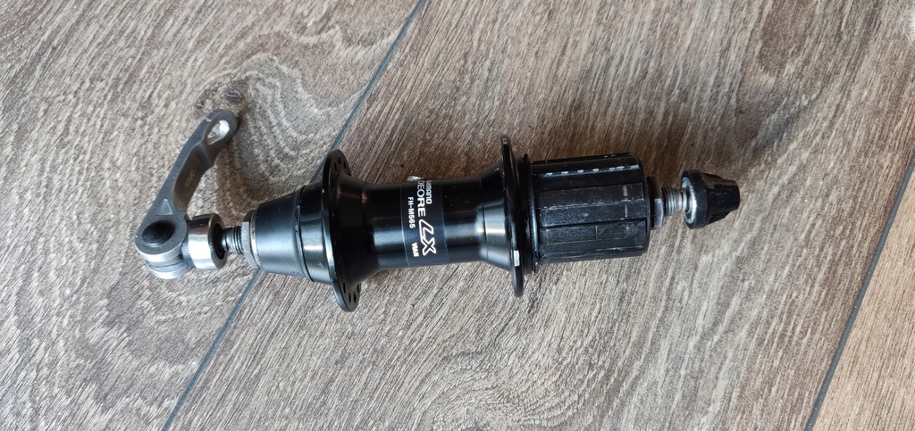 Piasta tylna Deore LX FH-M565 SHIMANO 32otw. - 9605057060 - oficjalne archiwum Allegro