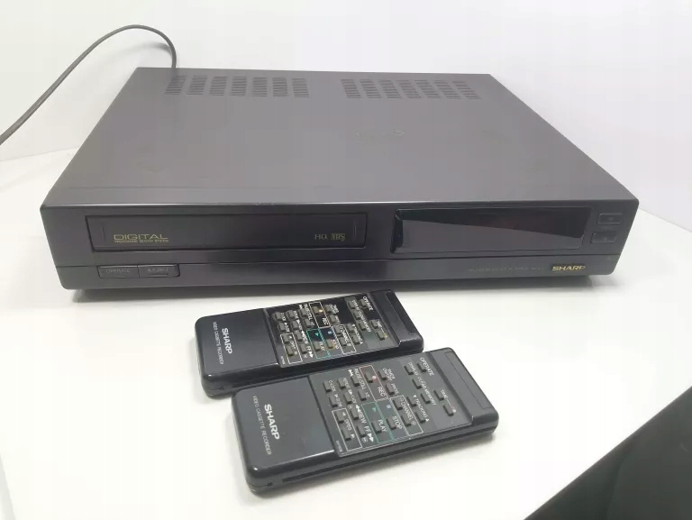 MAGNETOWID NAGRYWARKA VHS SHARP VC-A30 + 2 PILOTY - 14485107624 - oficjalne archiwum Allegro