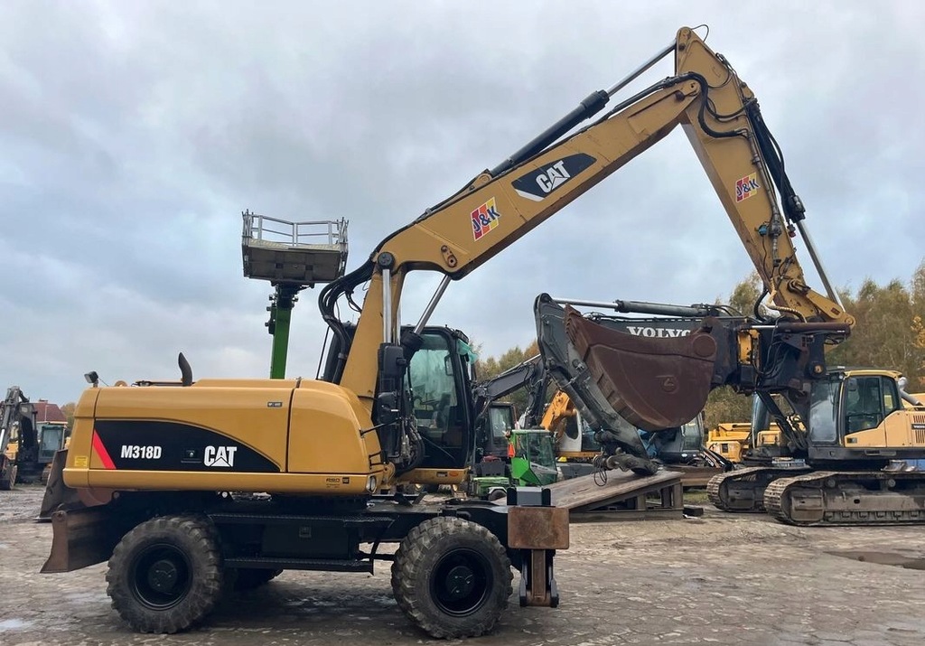 Caterpillar M318D Koparka kolowa Caterpillar M... - 14619570365 ...