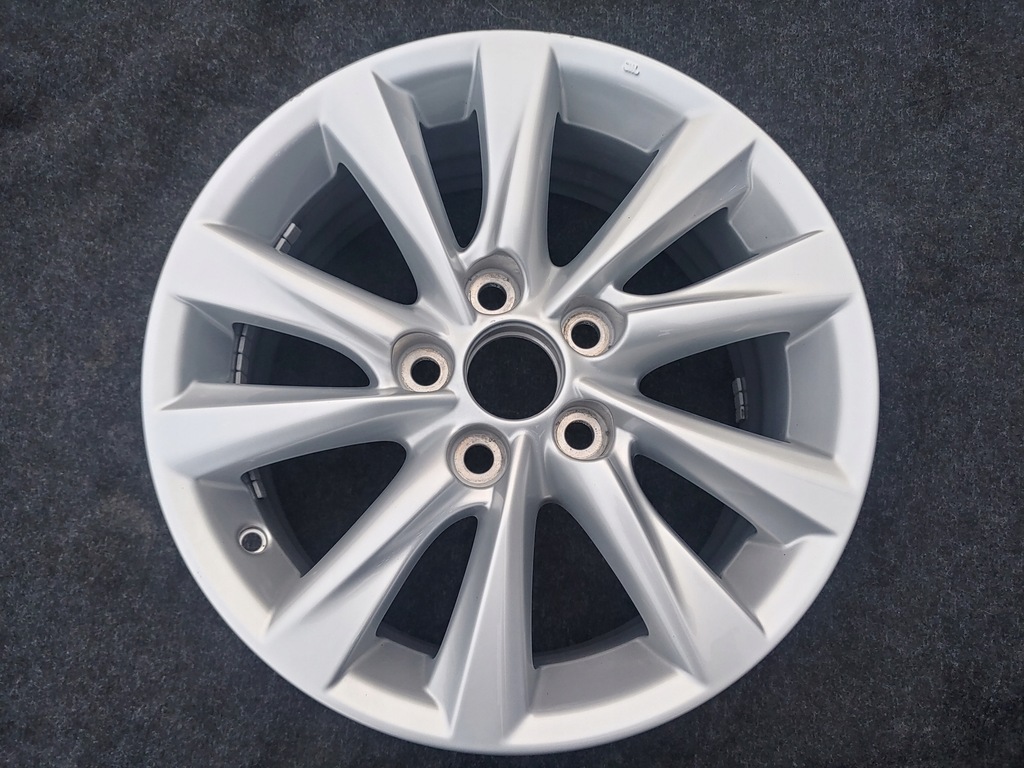 FELGA TOYOTA COROLLA E21 LIFT 16 ORYGINAŁ - 15243822695 - oficjalne ...