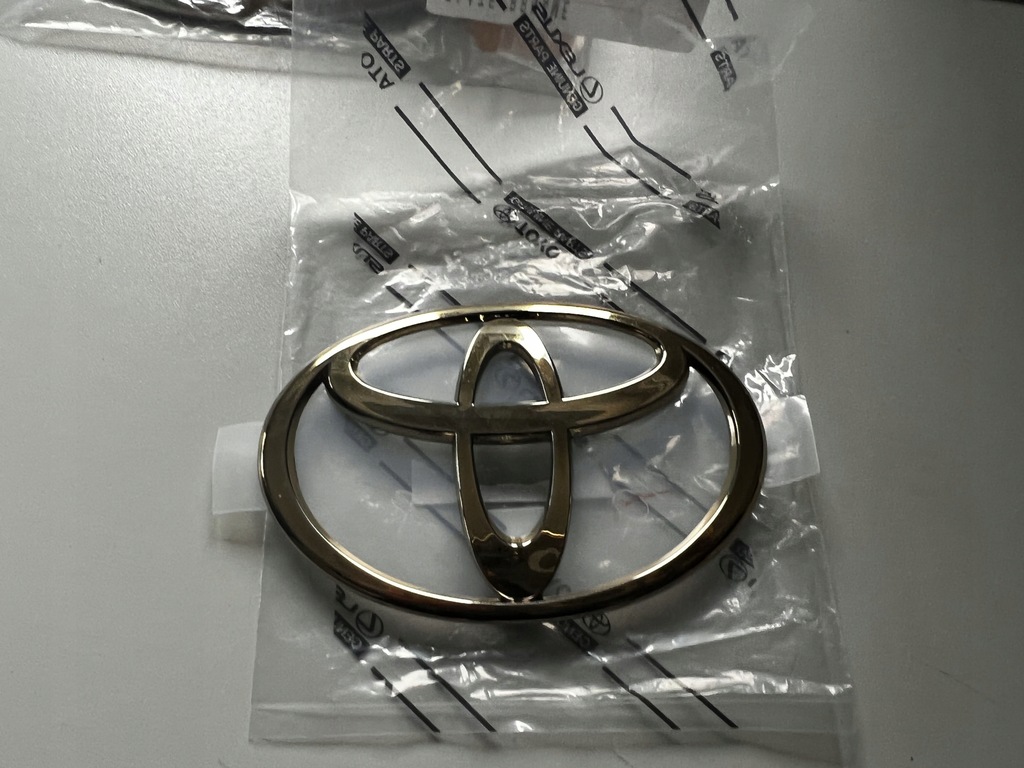 TOYOTA LAND CRUISER FZJ100 EMBLEMAT W KLAPE - 13102591335 - oficjalne ...