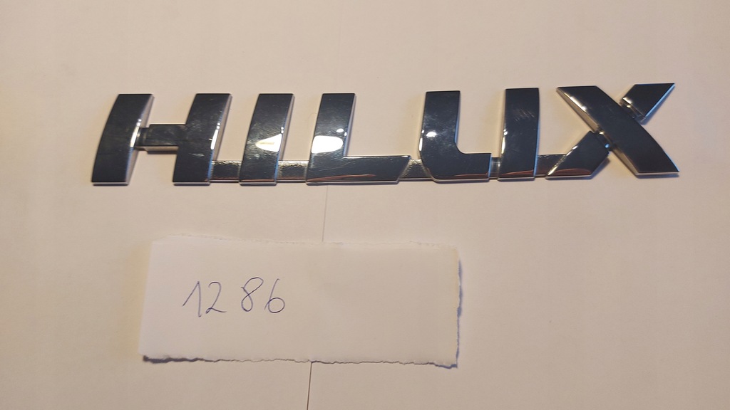 LOGO ZNACZEK EMBLEMAT NAPIS TOYOTA HILUX 15- DRZWI - 12973857102 ...