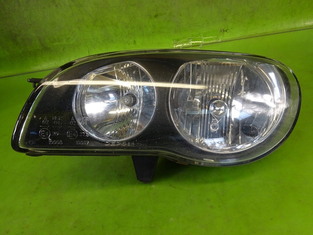 Reflektor lewy lampa przód TOYOTA COROLLA E11 LIFT - 12141685921 - oficjalne archiwum Allegro