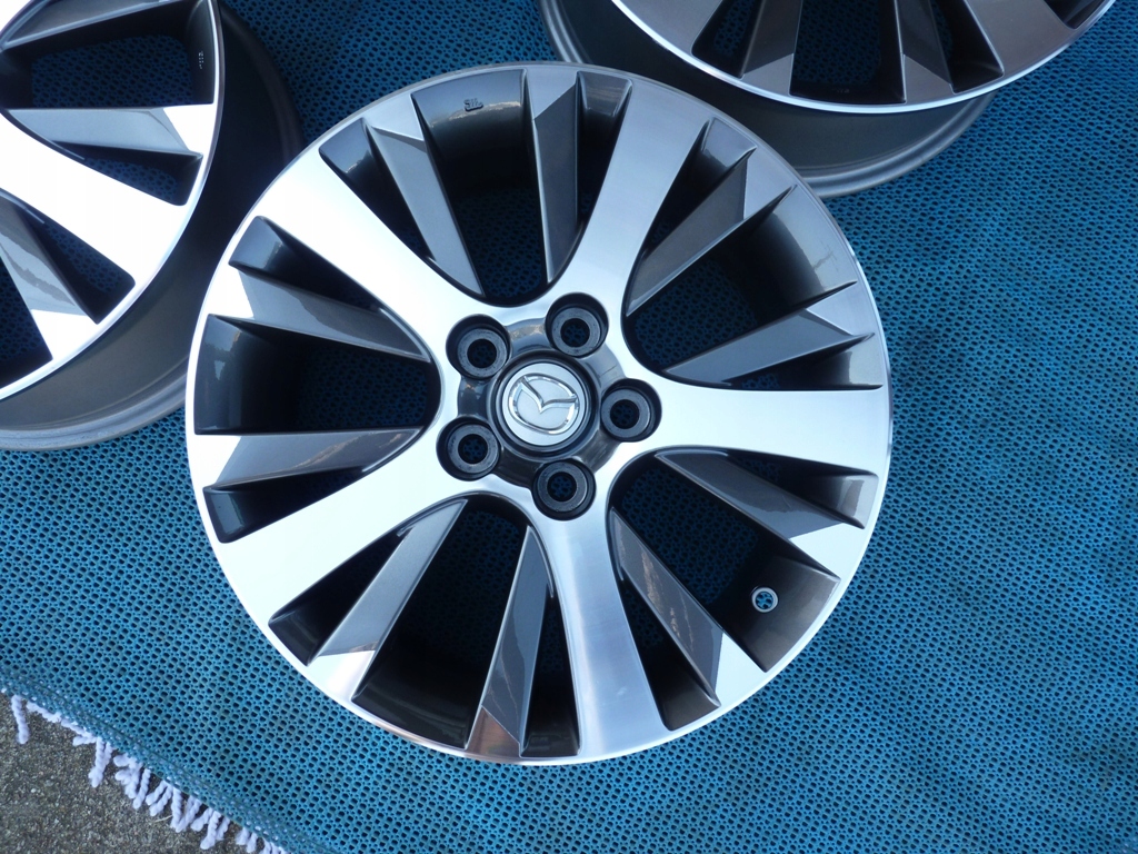 FELGI ALU 17'' 5X114,3 ET60 MAZDA ORYGINAŁ - 9096184231 - oficjalne ...