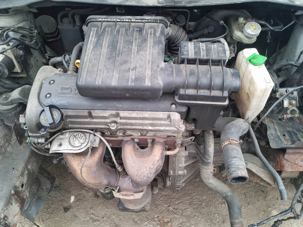 SILNIK KOMPLETNY SUZUKI SWIFT 1.3 M13A W AUCIE - 12983263886 ...