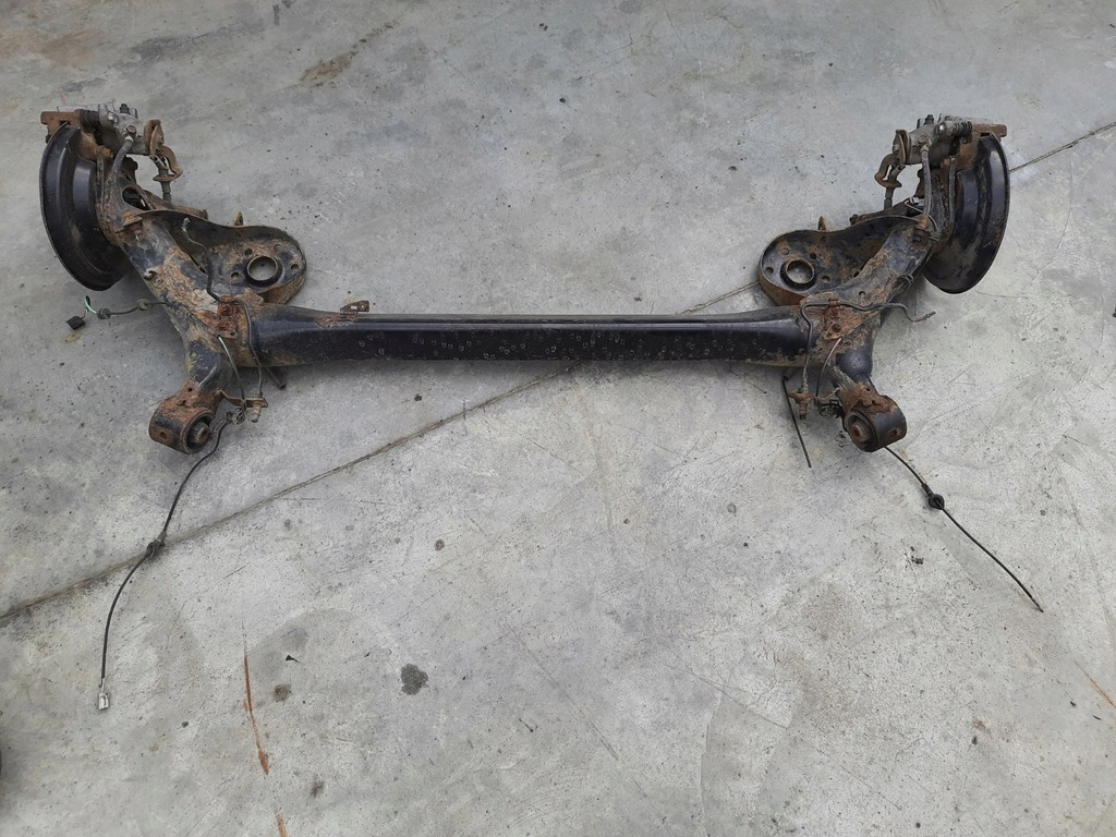 TOYOTA PRIUS III BELKA OŚ TYŁ ZAWIESZENIE - 10662686771 - oficjalne archiwum Allegro