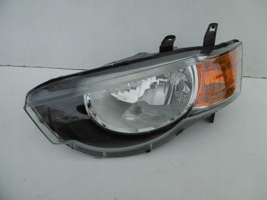 MITSUBISHI COLT Z30 08- LAMPA PRZÓD LEWA NOWA ORYG - 7769127524 ...