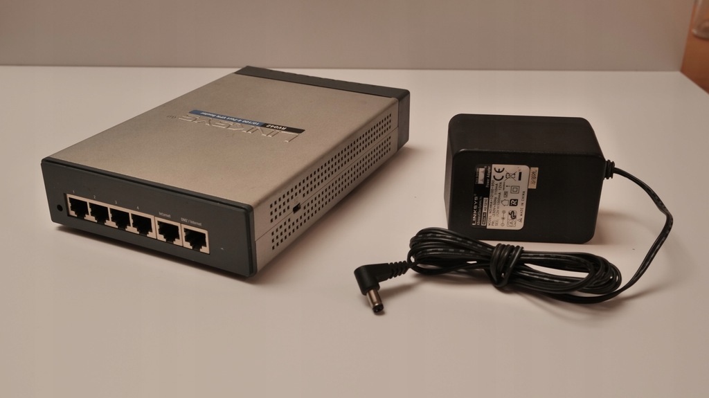 Router przewodowy Linksys RV042 z zasilaczem - 11293727239 - oficjalne ...
