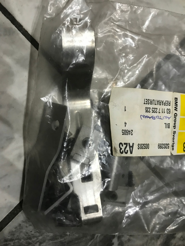 BMW zestaw naprawczy uchwytu reflektora lewy - 11814490437 - oficjalne ...