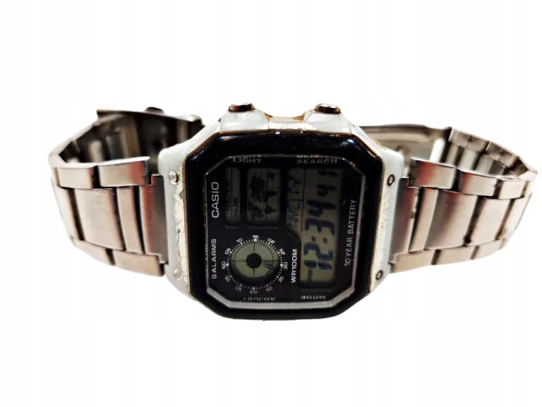 ZEGAREK ELEKTRONICZNY CASIO 3299 AE-1200WH - 12940440223 - oficjalne ...