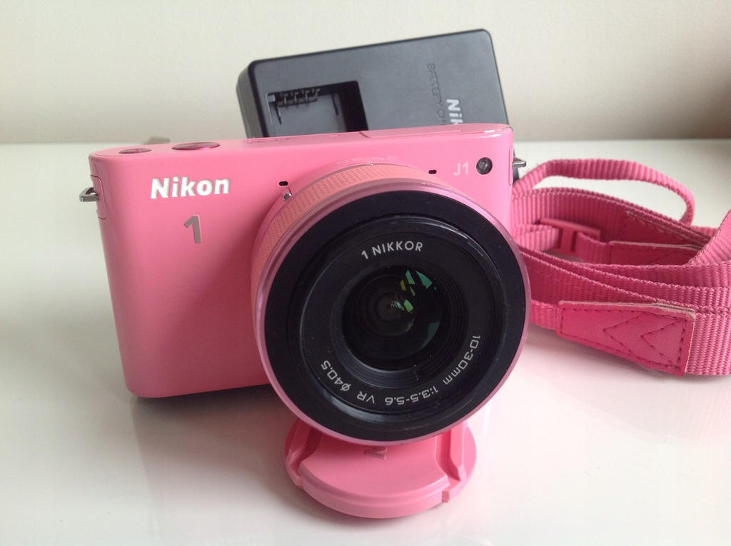 Aparat Nikon 1 J1 ob. Nikkor 10-30 różowy opis - 13284493361 ...