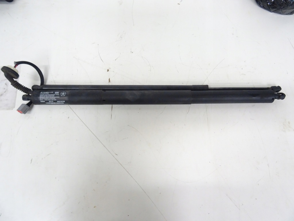 SIŁOWNIK KLAPY JEEP GRAND CHEROKEE WK2 68231347AB - 12692586631 ...