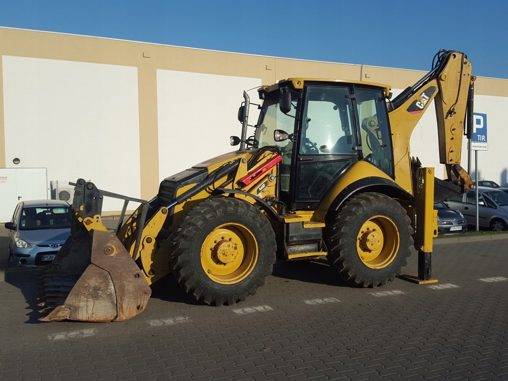 CAT 444 F 2013r 432 444F NOWE OPONY Caterpillar - 7728263172 ...