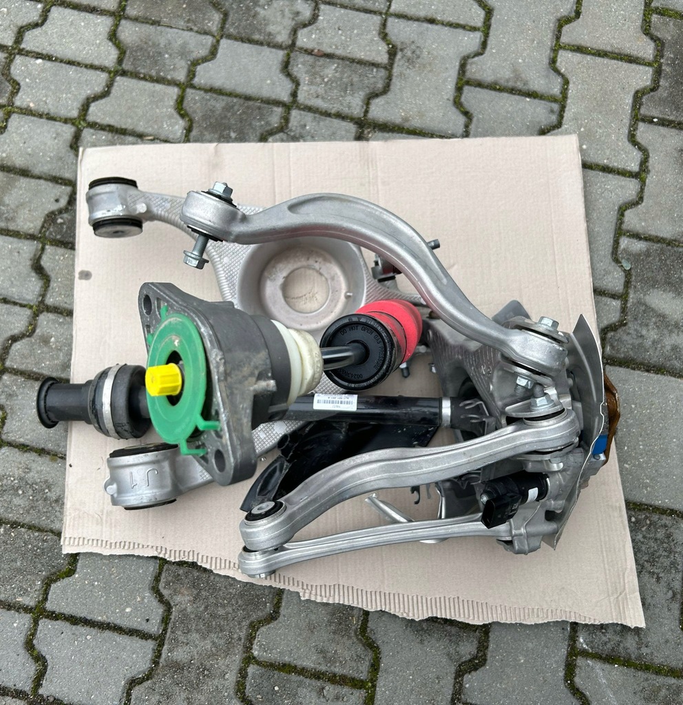 KOMPLETNE ZAWIESZENIE LEWY TYŁ PORSCHE TAYCAN - zwrotnica, wahacze itd ...