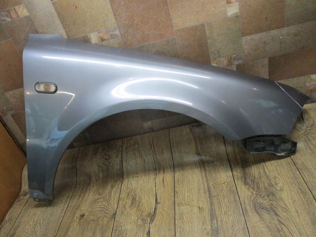 VW PASSAT B5 LIFT LD7W BŁOTNIK PRAWY PRZEDNI - 14003062064 - oficjalne ...