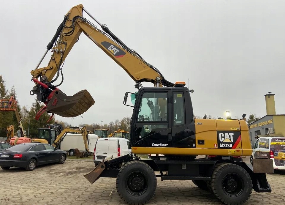 Caterpillar M313D - 12834686732 - oficjalne archiwum Allegro