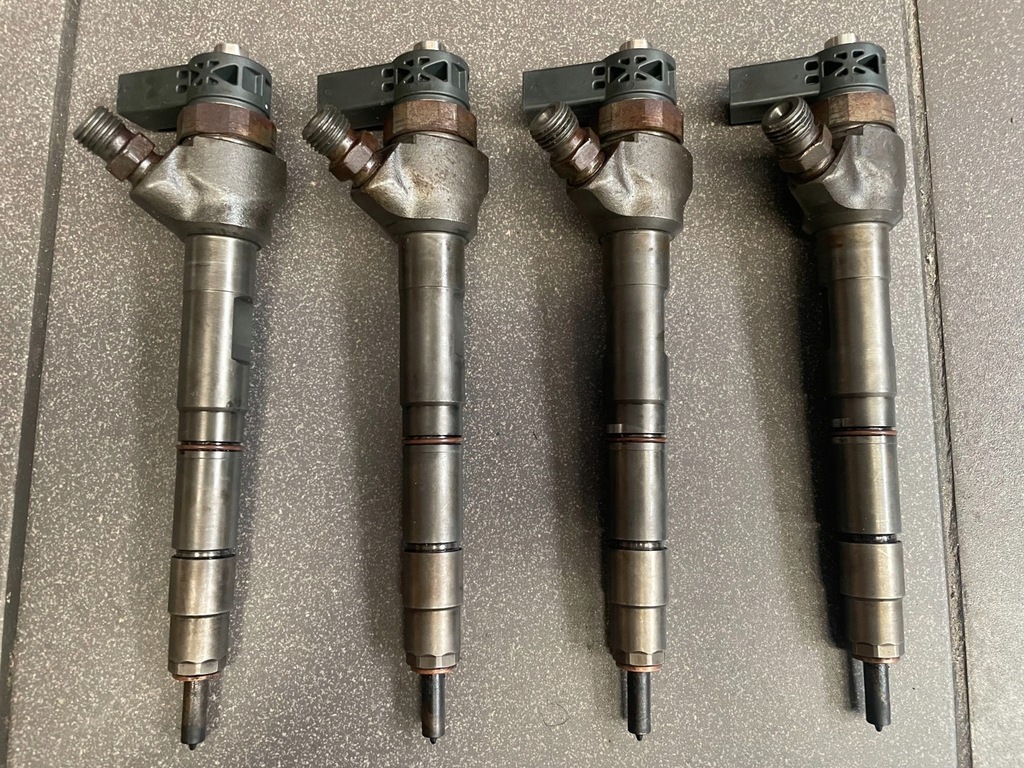 WTRYSKIWACZ 2.0 TDI VW AUDI SKODA 0445110369 03L130277J - 14465263551 ...