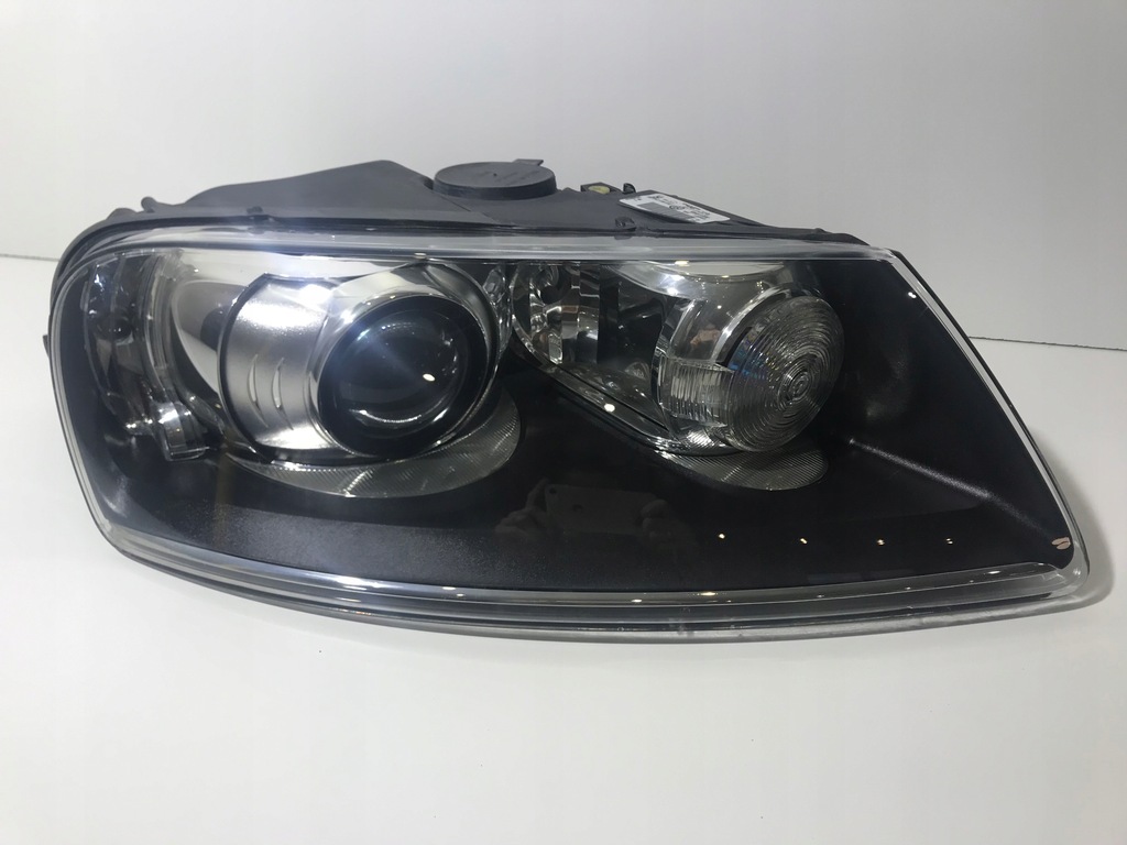 LAMPA VW TOUAREG XENON 7L6941018BN PRAWA - 9003893259 - oficjalne ...