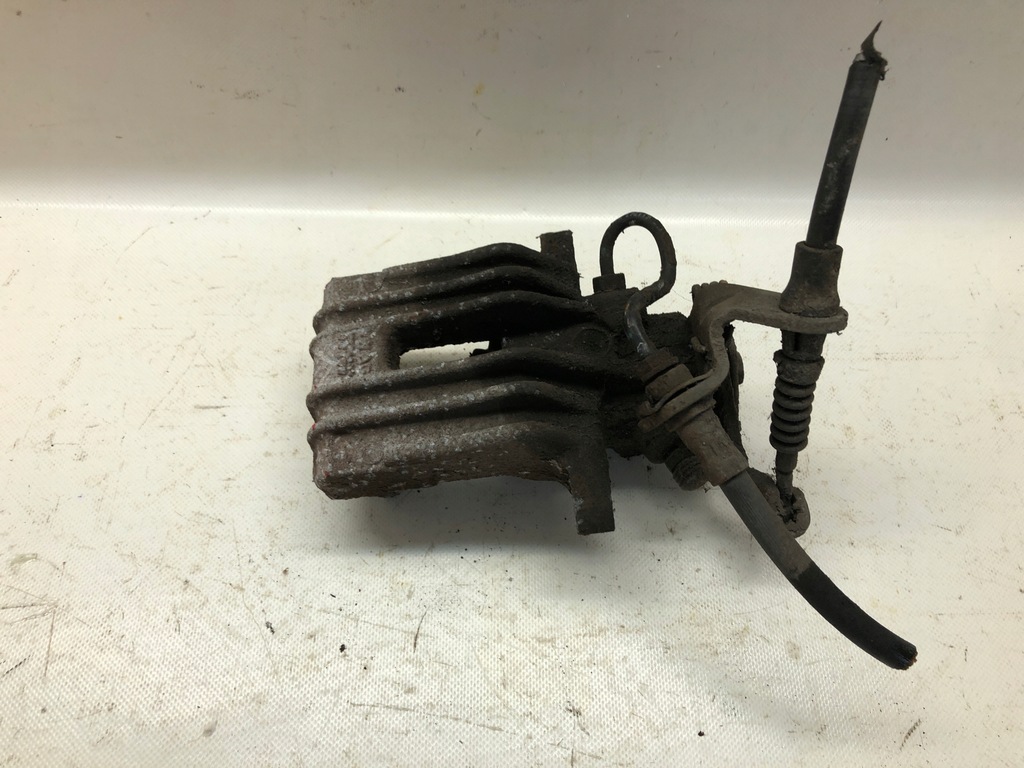 ZACISK TYŁ TYLNY LEWY AUDI A3 8P - 14119365658 - oficjalne archiwum Allegro