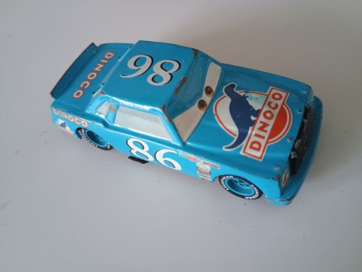 Metalowy samochodzik Mattel Disney Pixar Cars Marek Marucha Dinoco ...